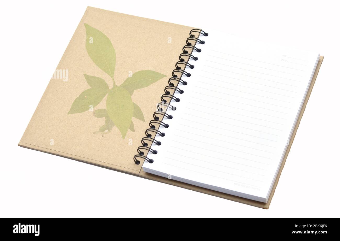 Open recycle notebook with tree pattern on cover Stock Photo - Alamy