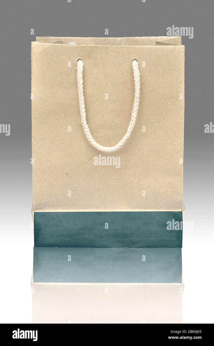 Recycle paper bag with shadow on white background Stock Photo - Alamy