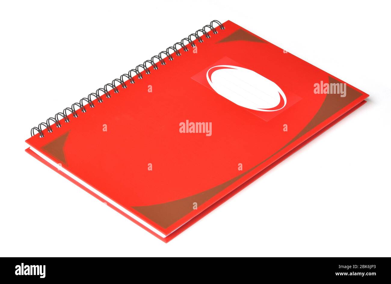 Red rectangular notebook with name lable on cover Stock Photo - Alamy