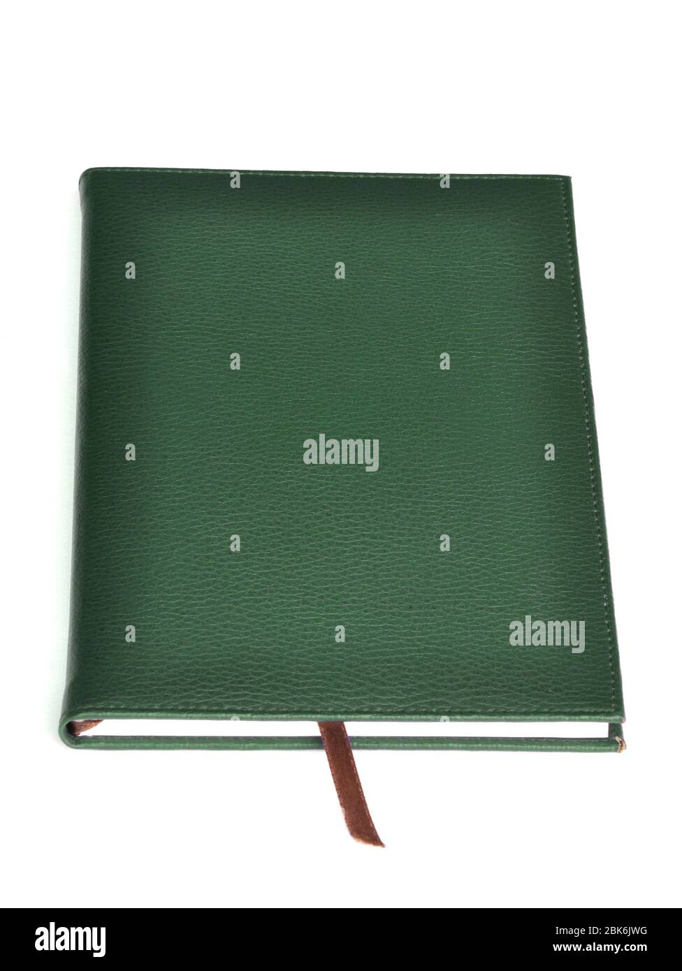 Dark green leather notebook on white background Stock Photo - Alamy