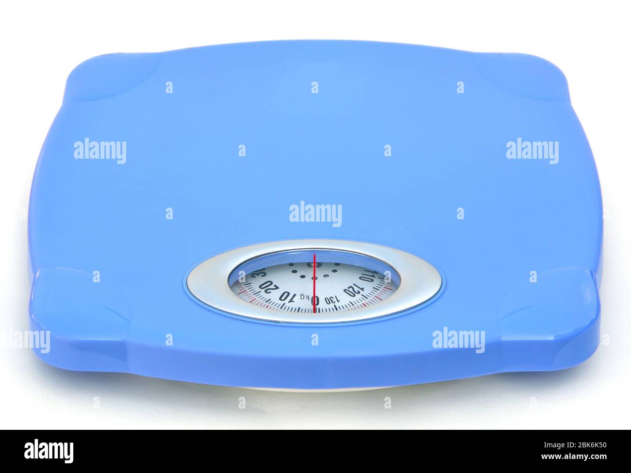 Sweet blue bathroom weight scale on white background Stock Photo - Alamy