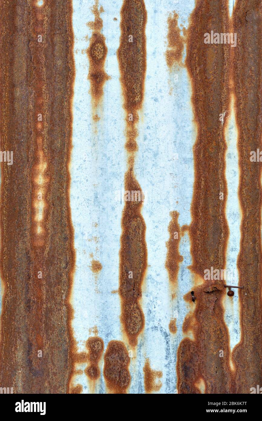 Rusty zinc metal plate background Stock Photo - Alamy