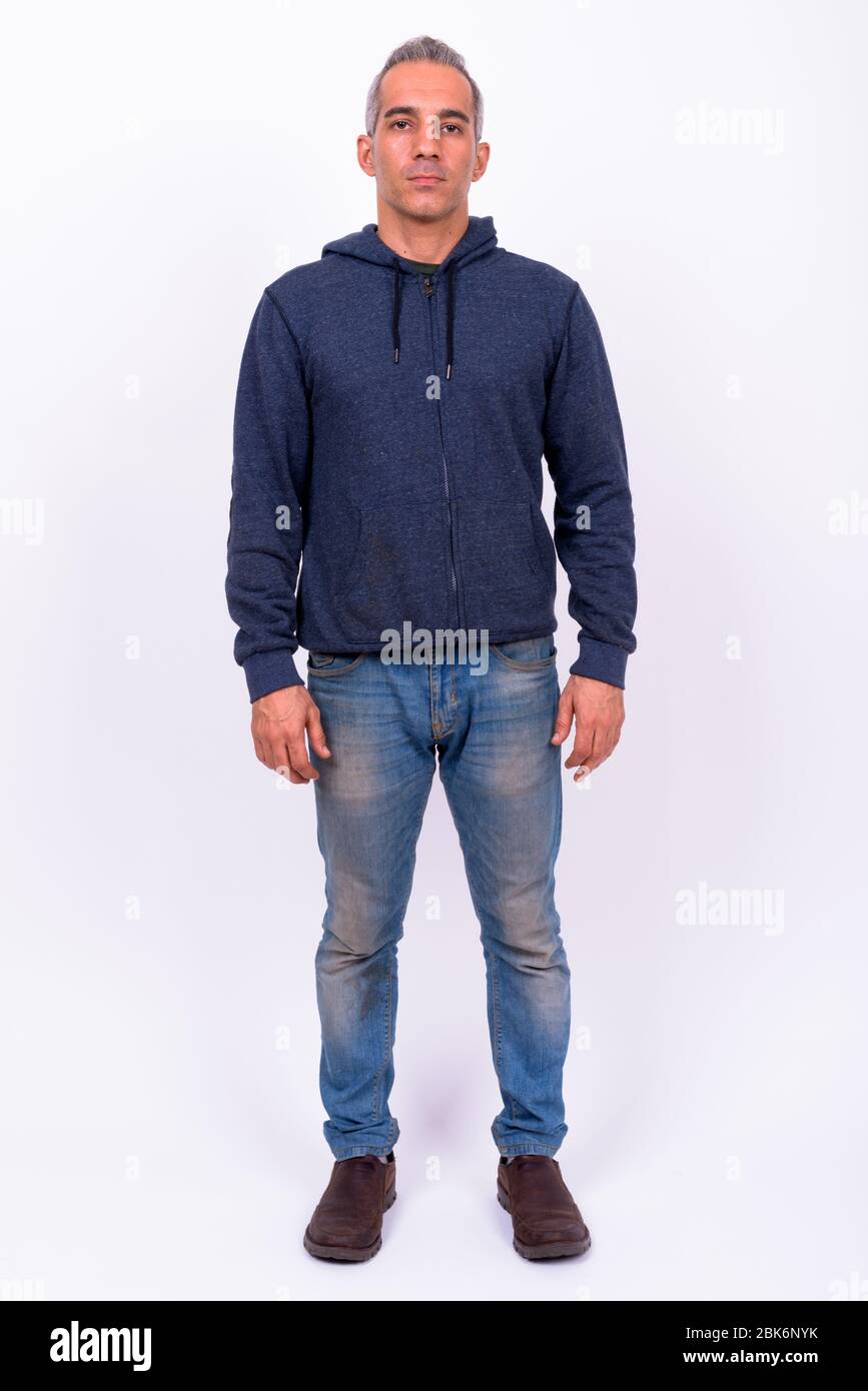 Full body shot of Persian man wearing hoodie Stock Photo - Alamy