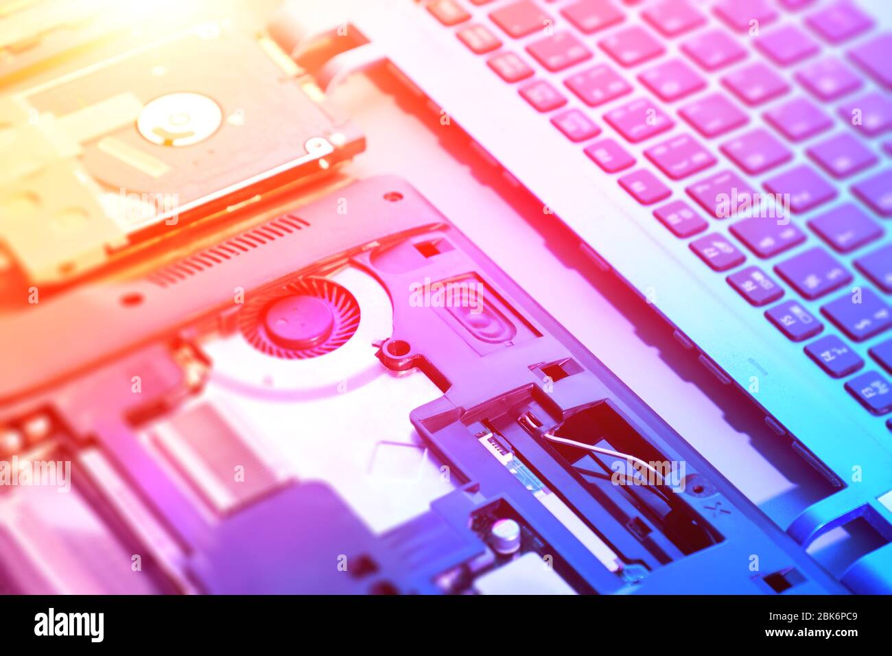 Closeup on electronic motherboard, neon light, hardware repair shop ...