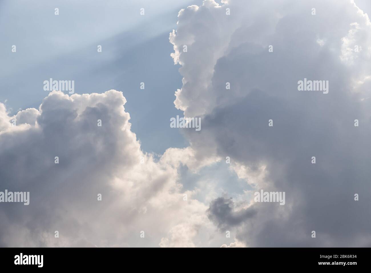 Beautiful sky. Sunlight, sun rays through clouds Stock Photo - Alamy