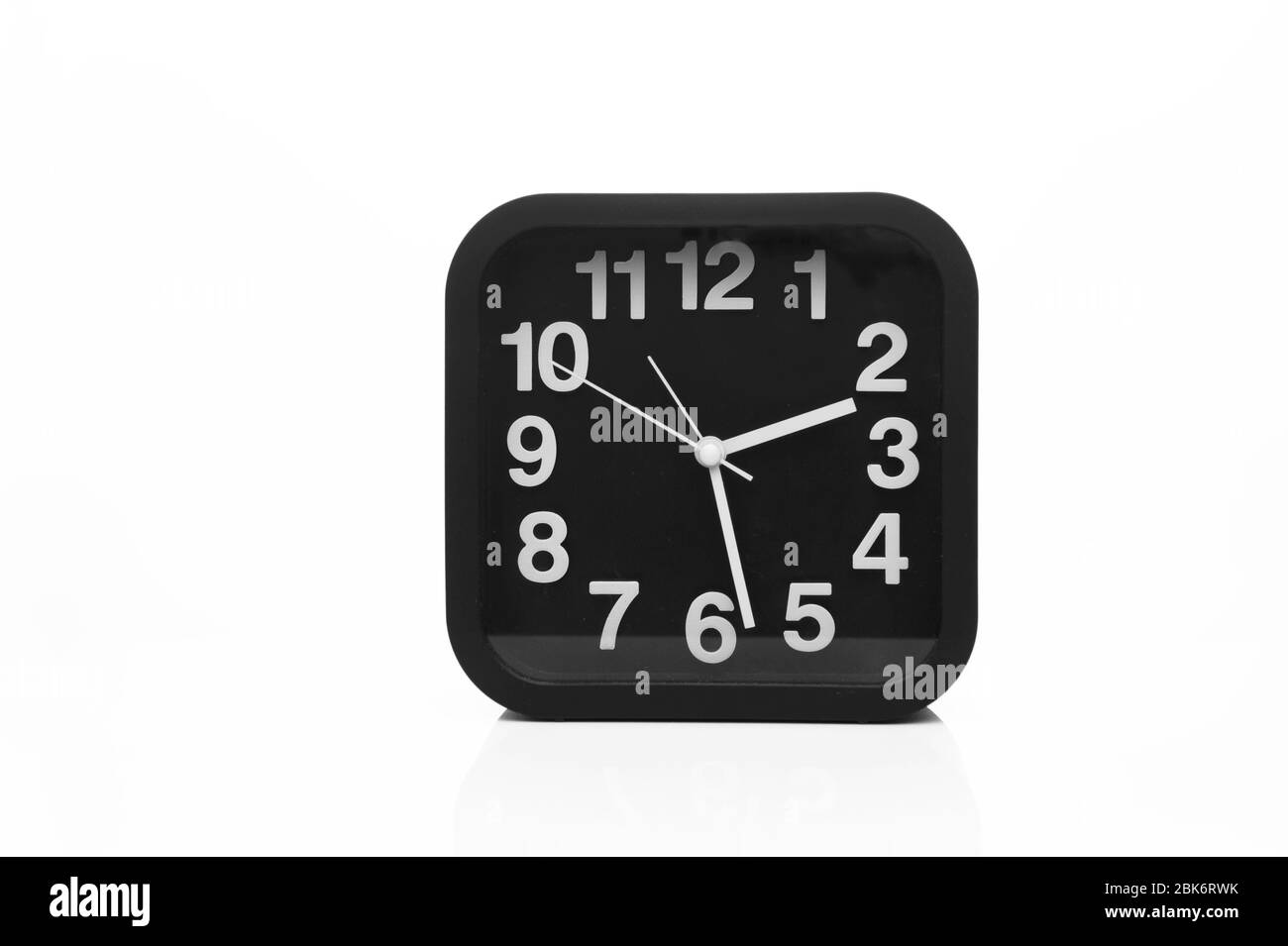 isolated black and white modern clock face show the time at two pm in ...