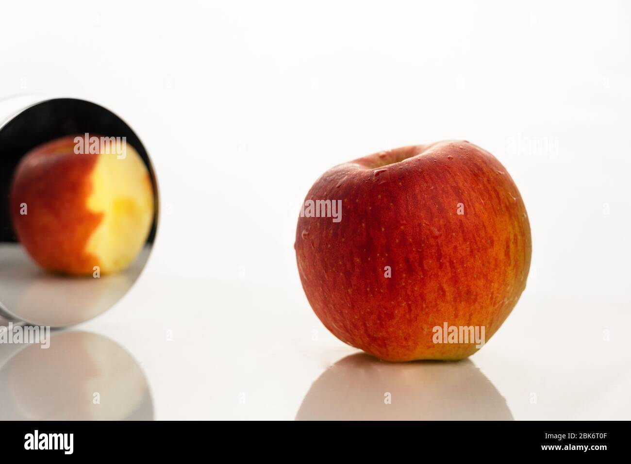 red orange yellow apple fruit for food in the mirror in paradox reality ...