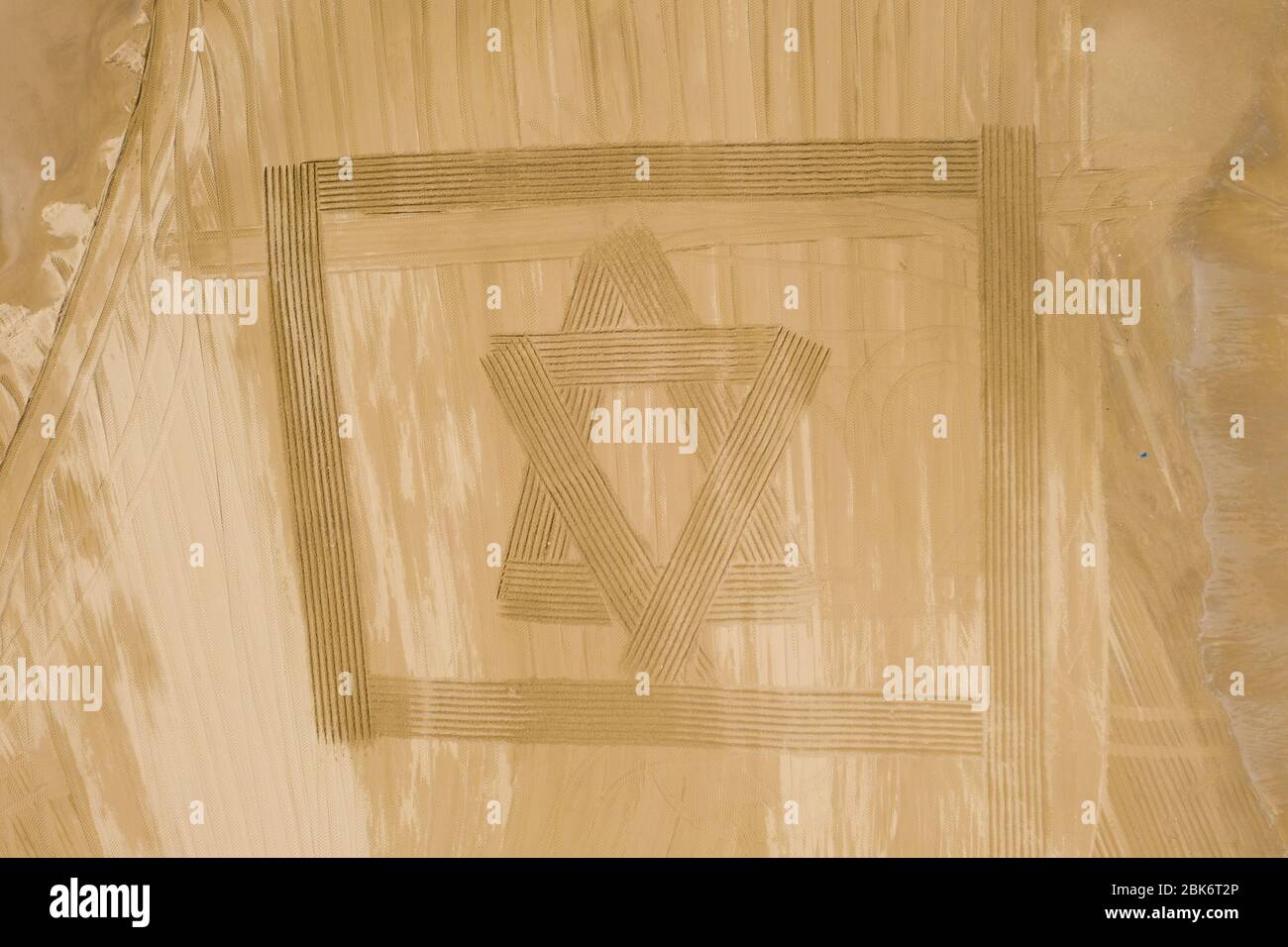 Flag of Israel designed in beach sand for independence day during ...