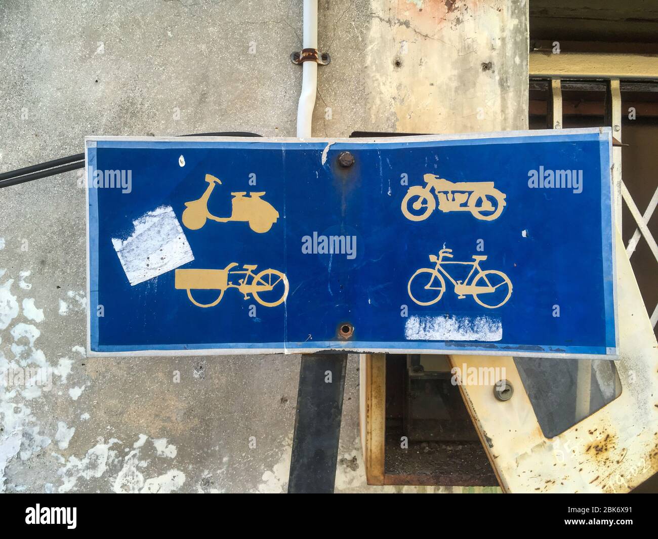 Blue traffic sign with rickshaws, motorcycles and bicycles Stock Photo ...