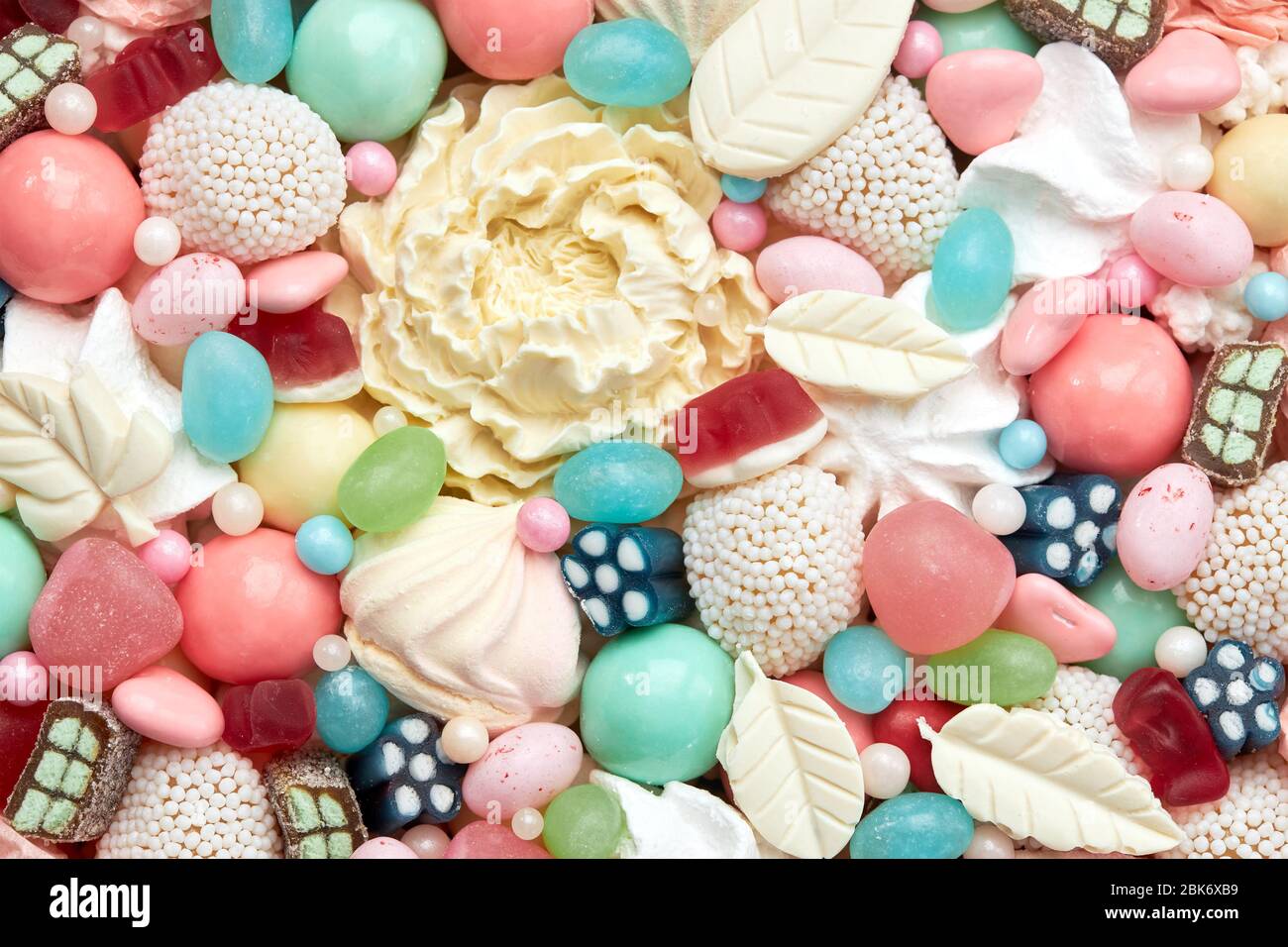 Multi-colored sweets and white handmade chocolate as a gift, close-up ...