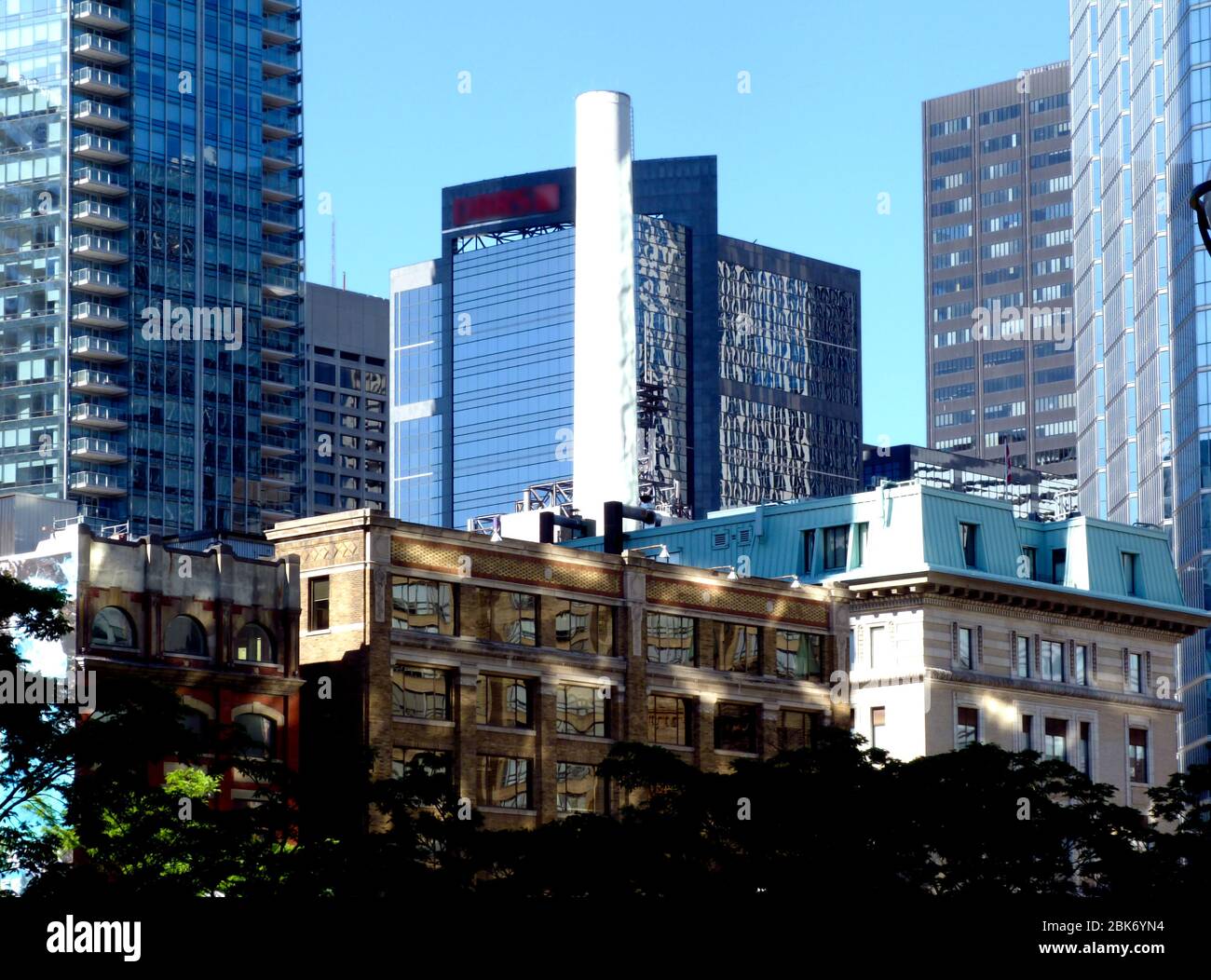 Toronto downtown with tall and reflective glass office tower buildings ...