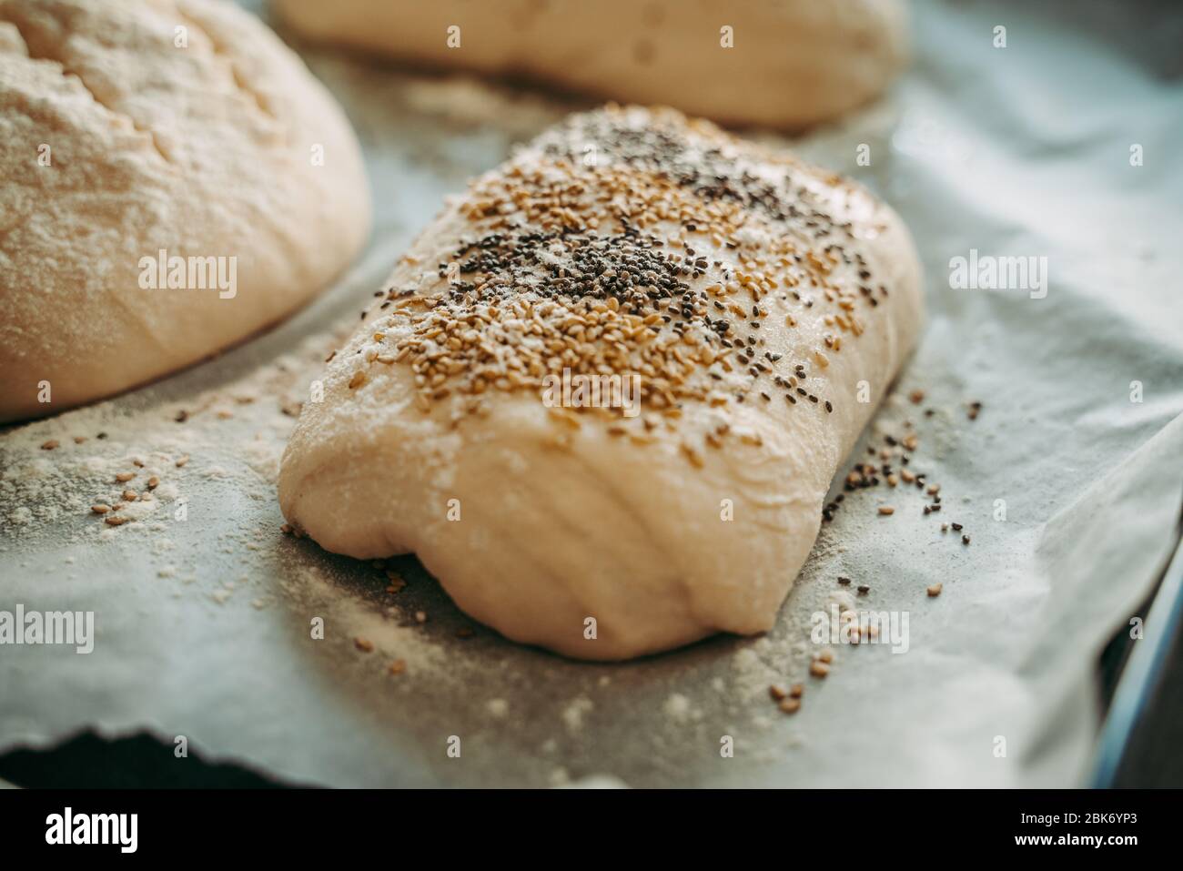 Uncooked small bread sesame hi-res stock photography and images - Alamy