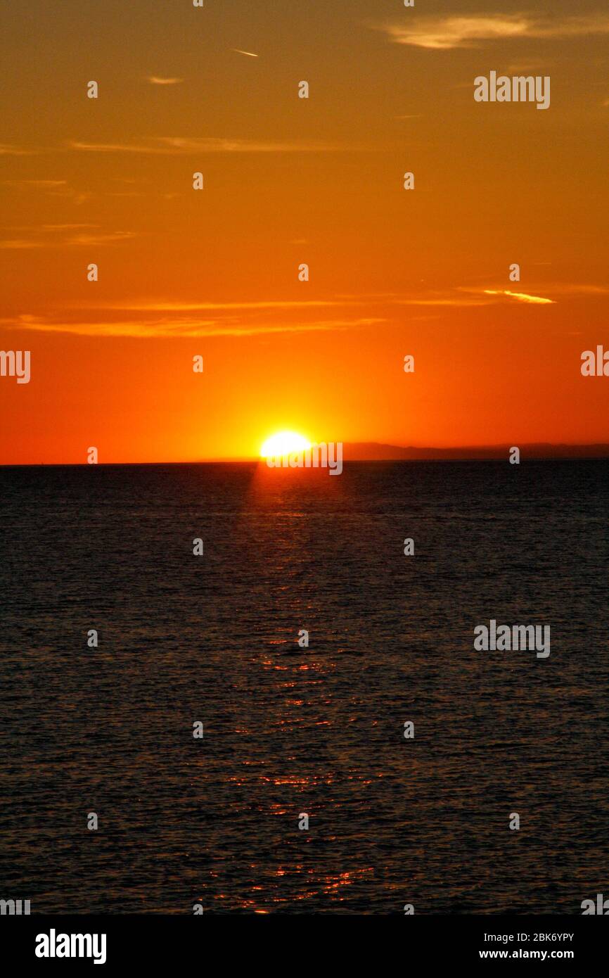 Abstract sunrise over ocean sun hi-res stock photography and images - Alamy