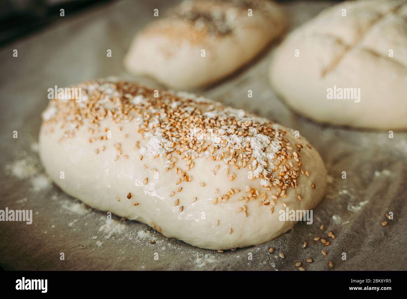 Uncooked small bread sesame hi-res stock photography and images - Alamy