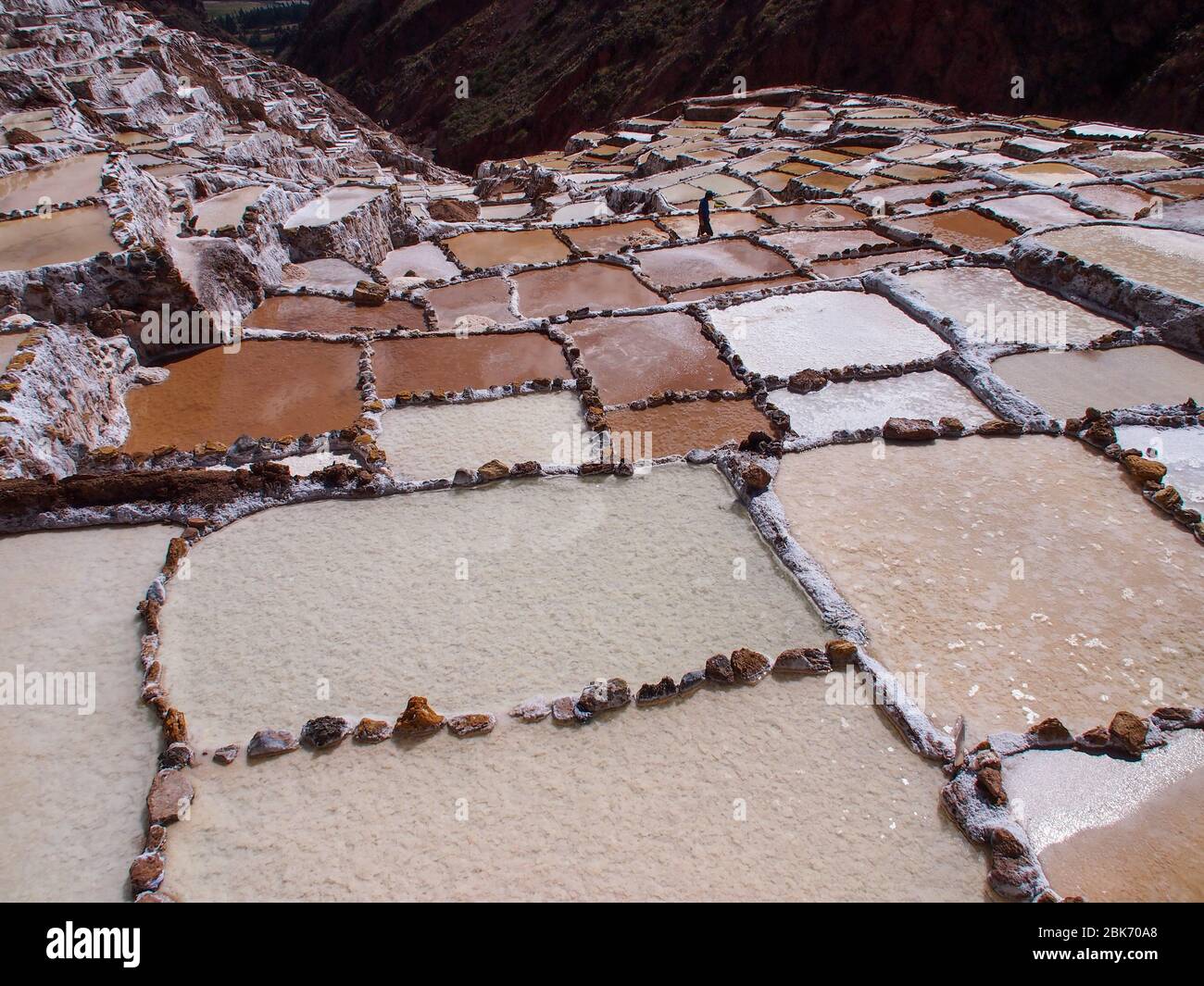 Sunny and brown Salt Mines in Maras, Peru Stock Photo - Alamy