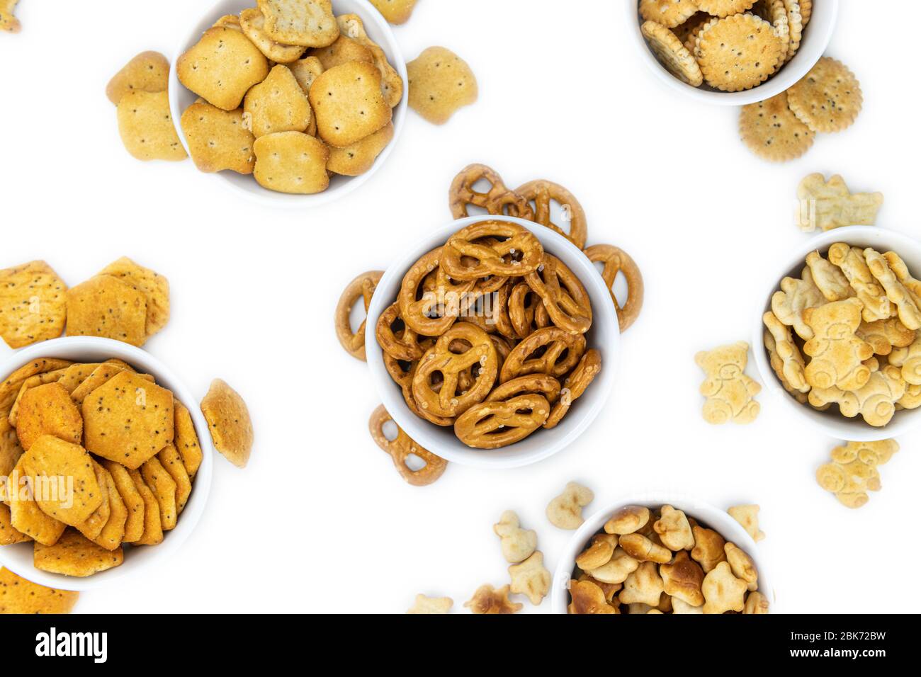 Portion of mixed Snacks isolated on white background (detailed close up ...