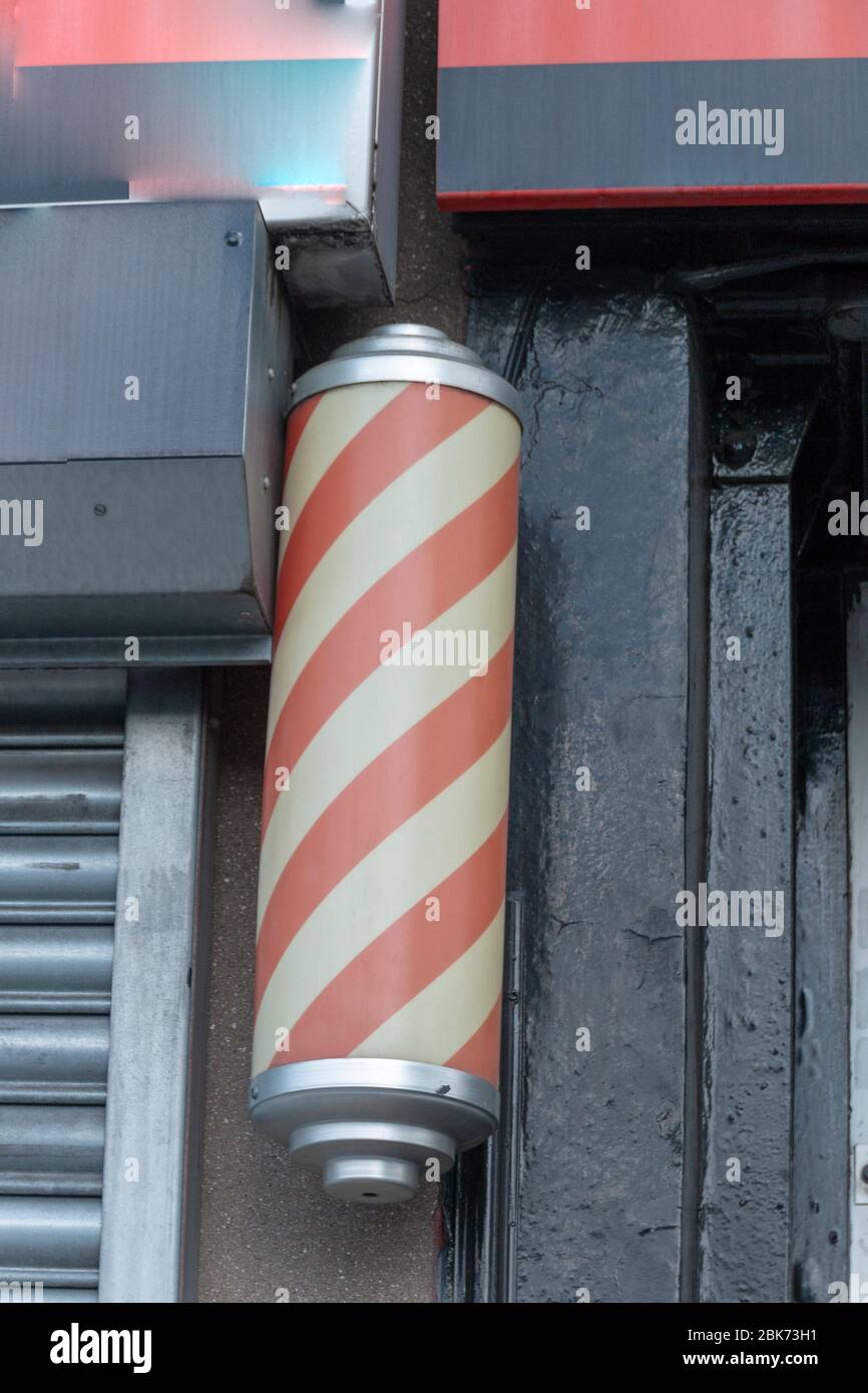 Red and white barber pole hi-res stock photography and images - Alamy