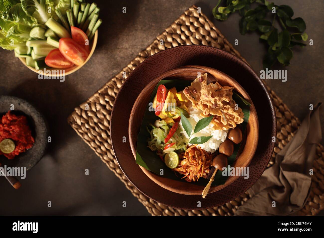 Nasi Campur. Traditional Indonesian meal of rice with meat and ...