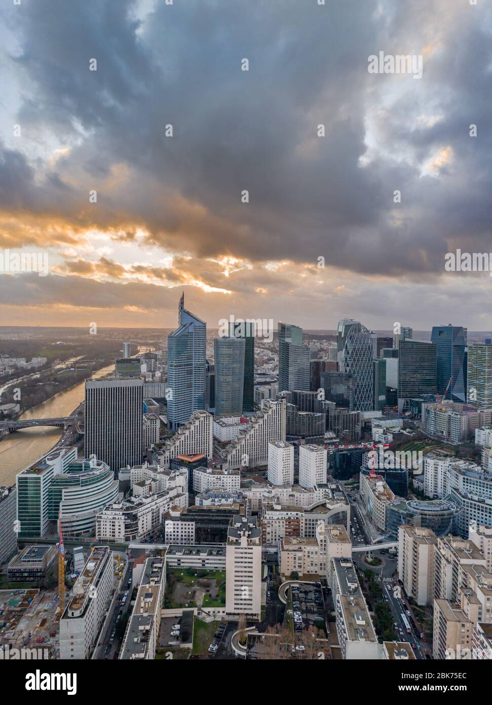 Aerial drone shot of la defense skyscraper complex during sunset golden ...