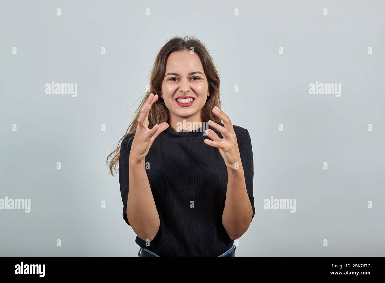 Angry Irritated Girl Is Angry, Nervous, Straining Her Face And Fingers ...