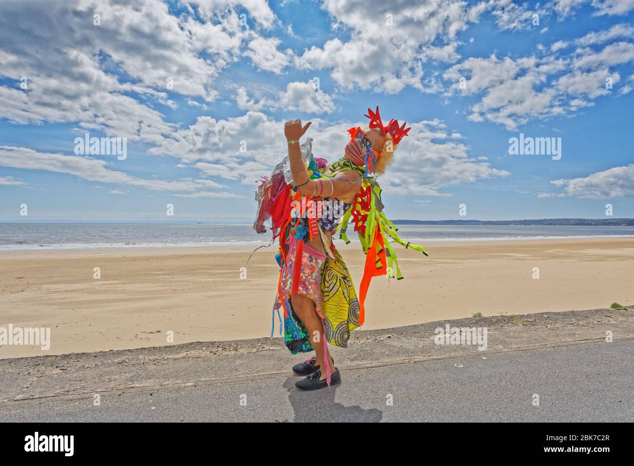 A man known as Tam dances on the path in Swansea Bay Stock Photo - Alamy