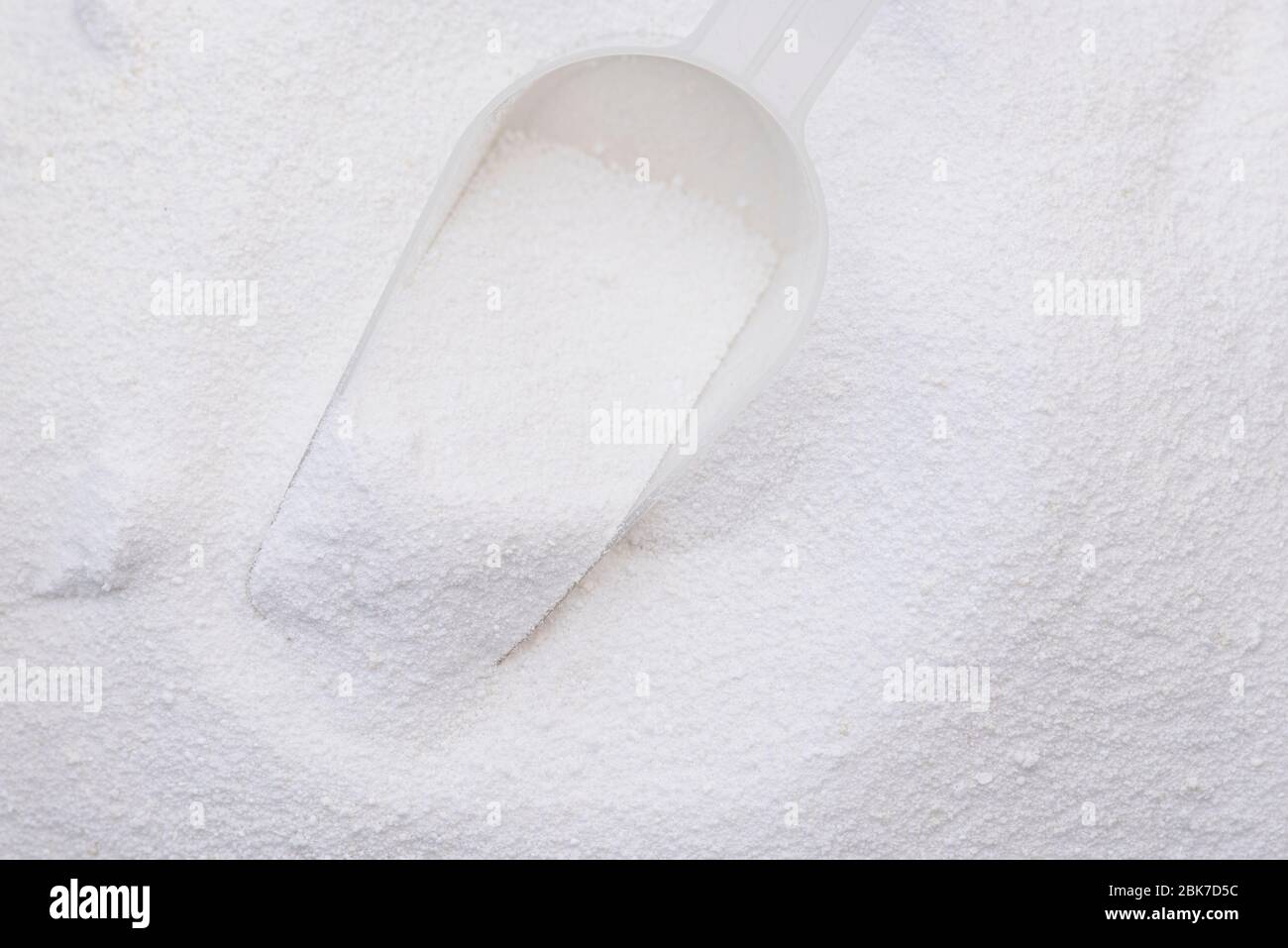 Close-up surface of white washing powder, washing laundry detergent ...