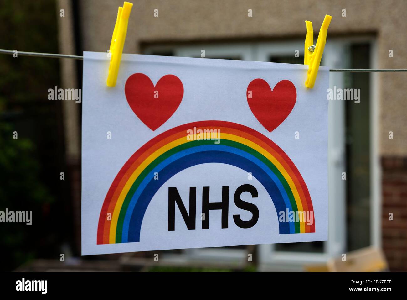NHS Rainbow Flag pegged on line Stock Photo - Alamy