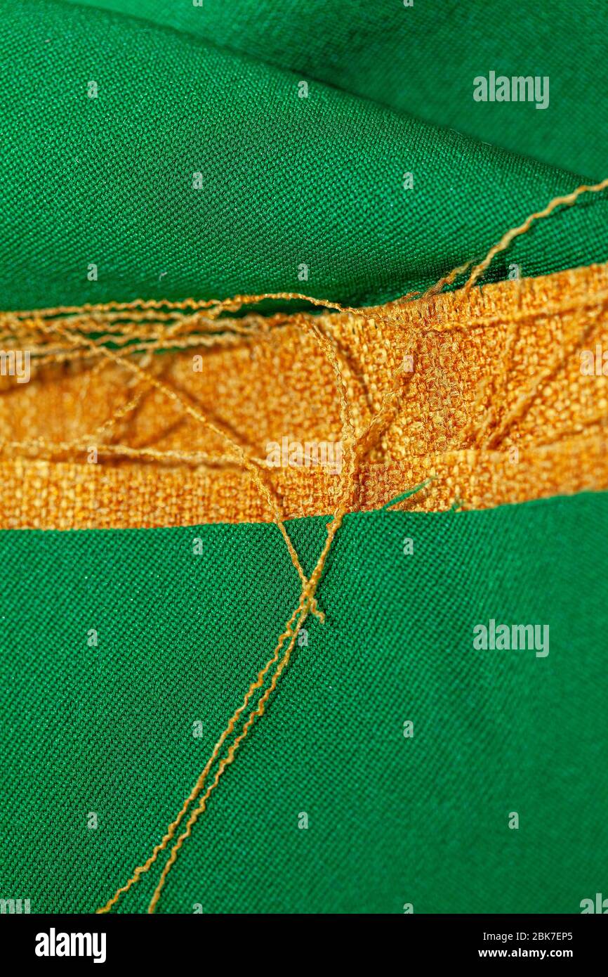 fabric pieces with threads and textile background Stock Photo - Alamy