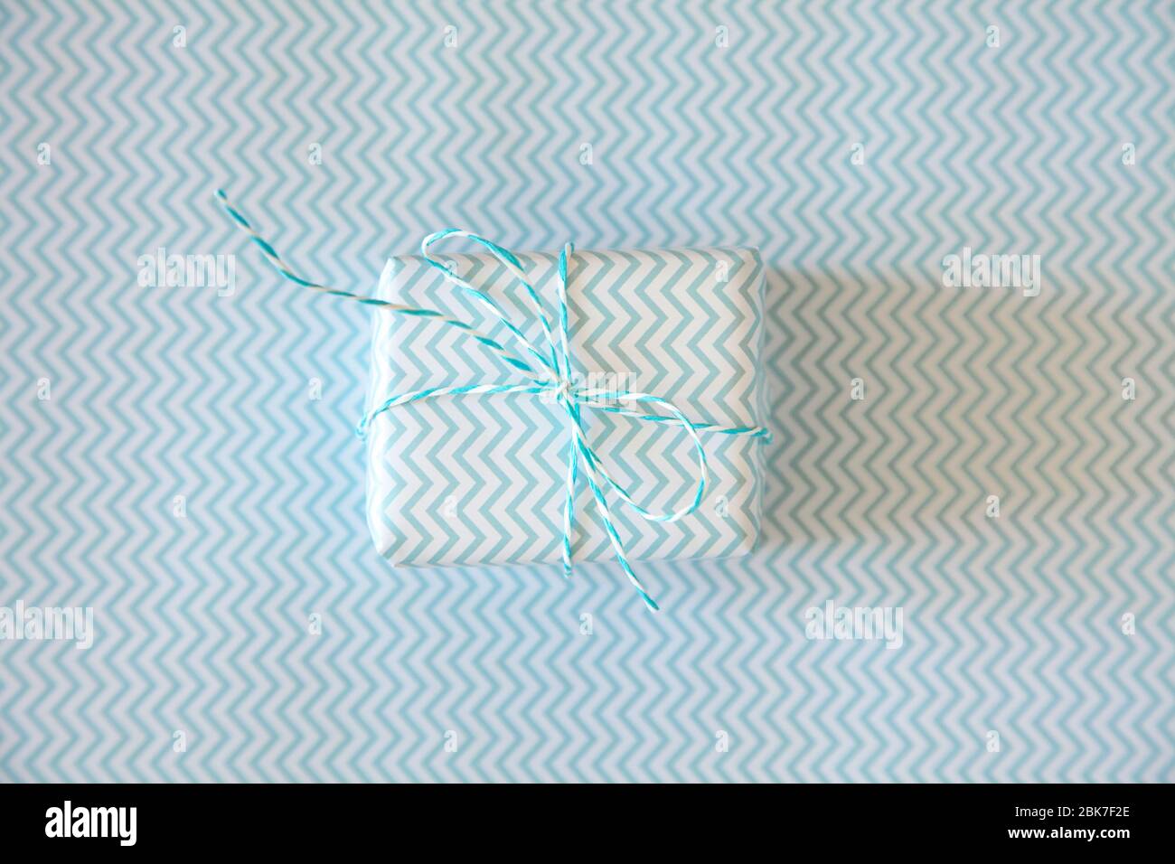 Light blue gift with ribbon on the white background with wave Stock ...