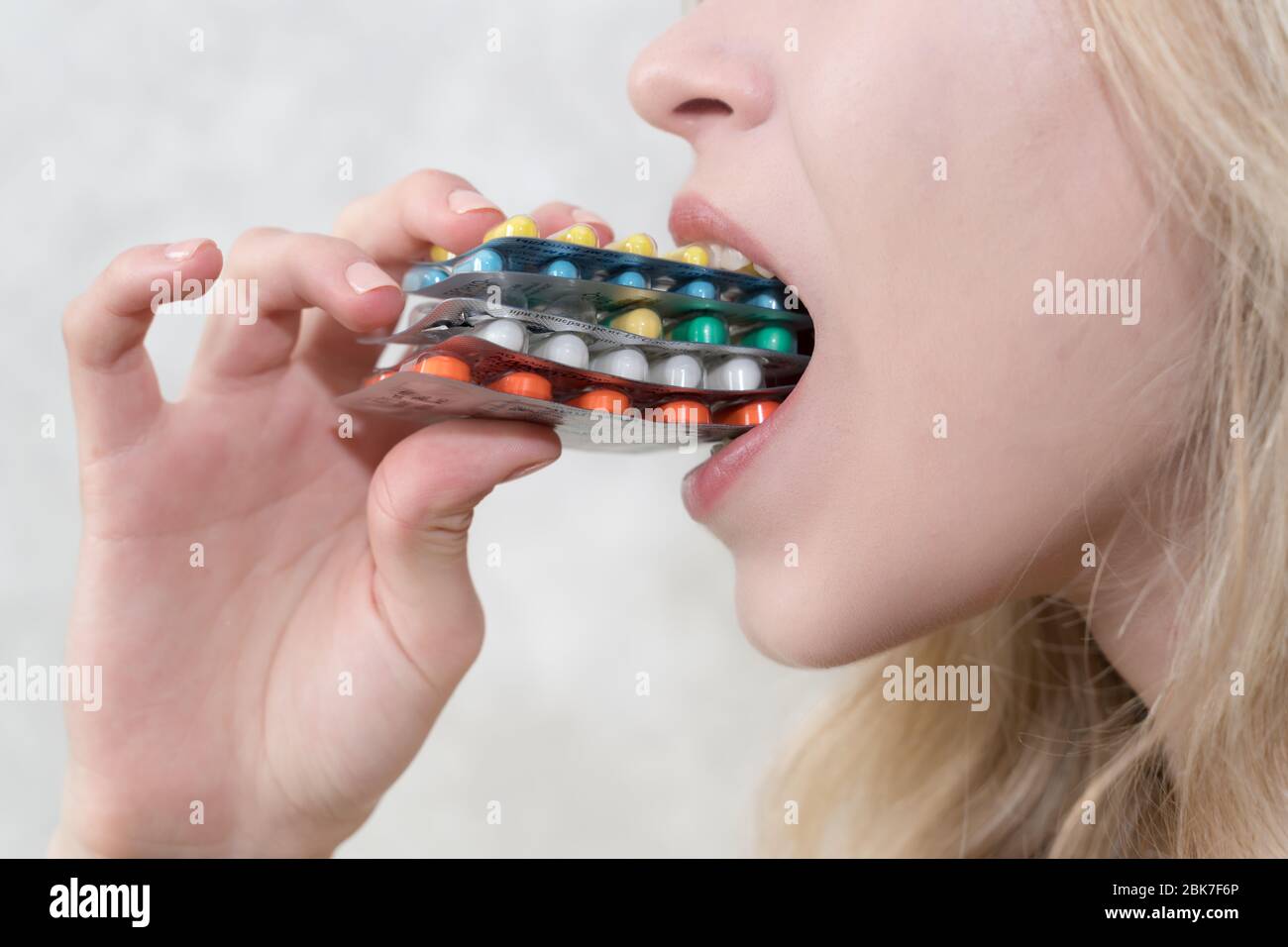 Woman and pill mouth hi-res stock photography and images - Alamy