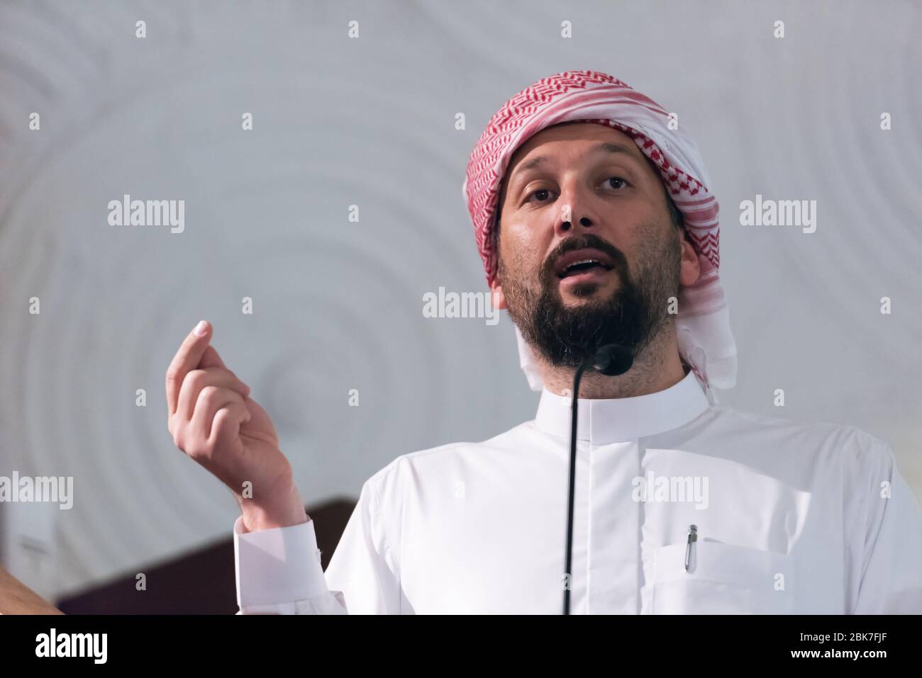 Muslims young arabic Imam has a speech on friday afternoon prayer in ...