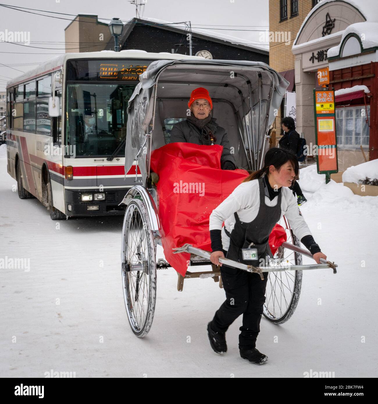 Lady pulling cart hi-res stock photography and images - Alamy