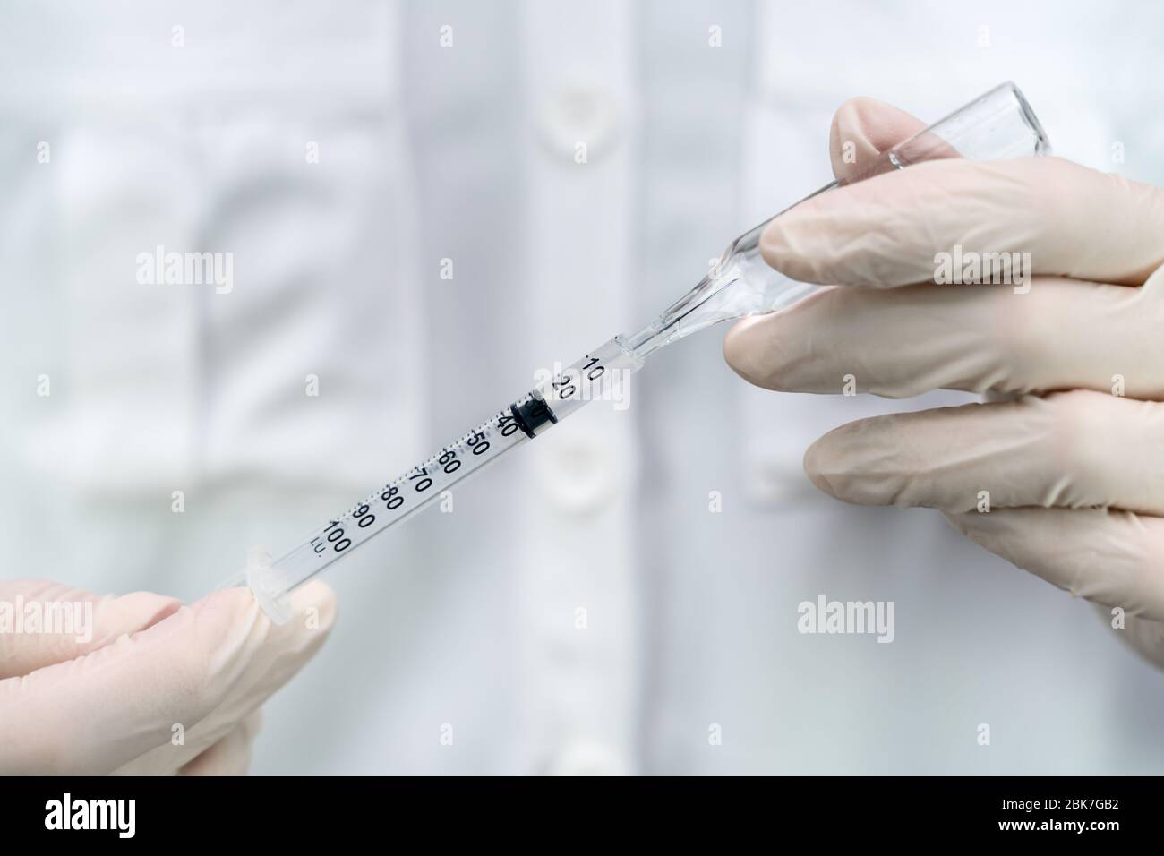 girl picking medicine in a syringe closeup Stock Photo - Alamy