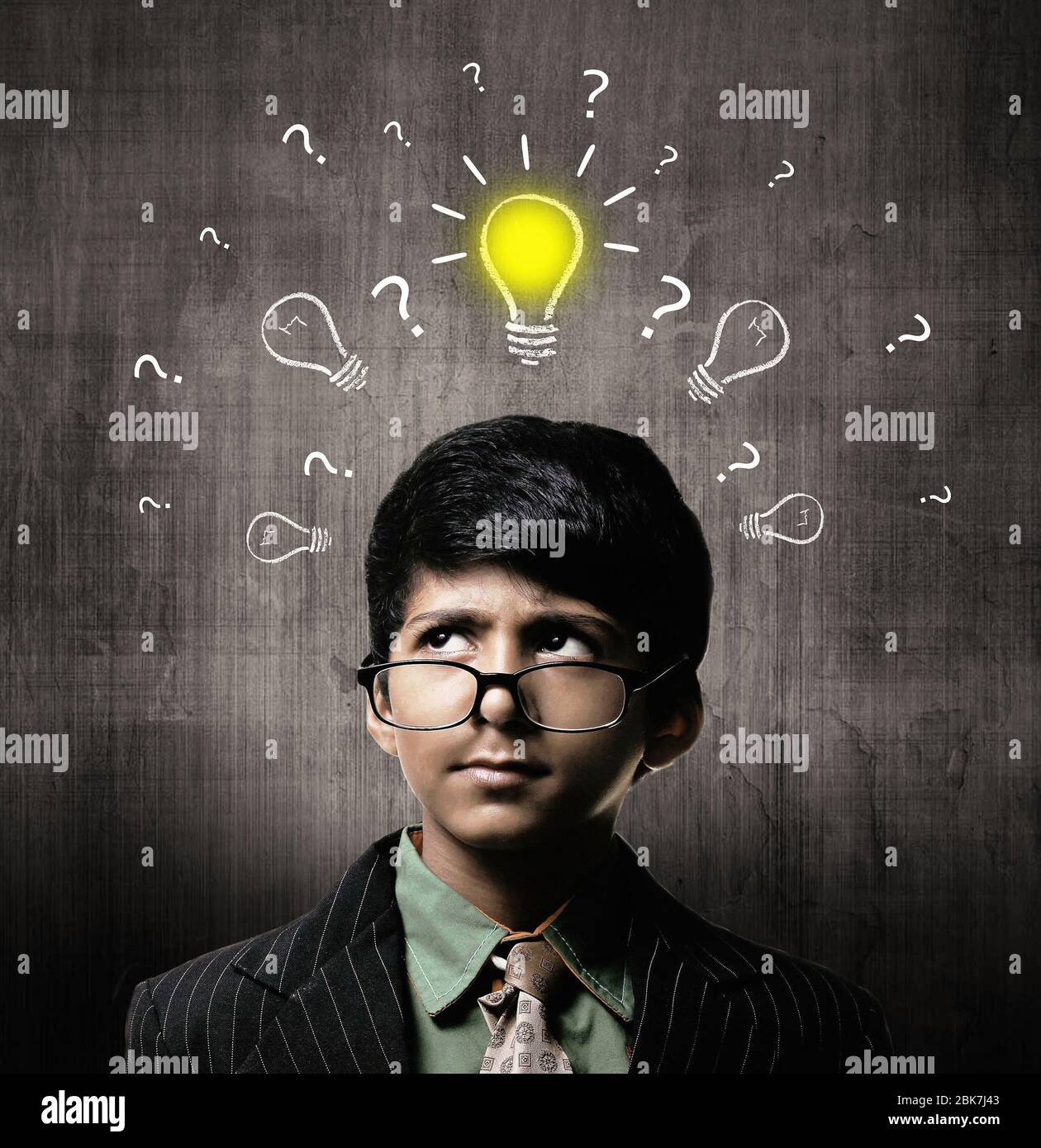 Cute Intelligent Little Boy Wearing Glasses, Thinking While Standing ...