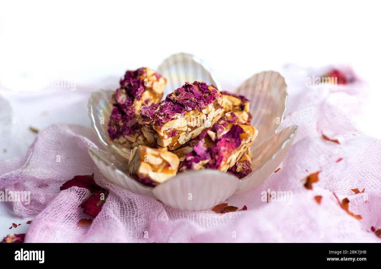 Rose natural candy dessert with natural flowers and peanuts Stock Photo ...