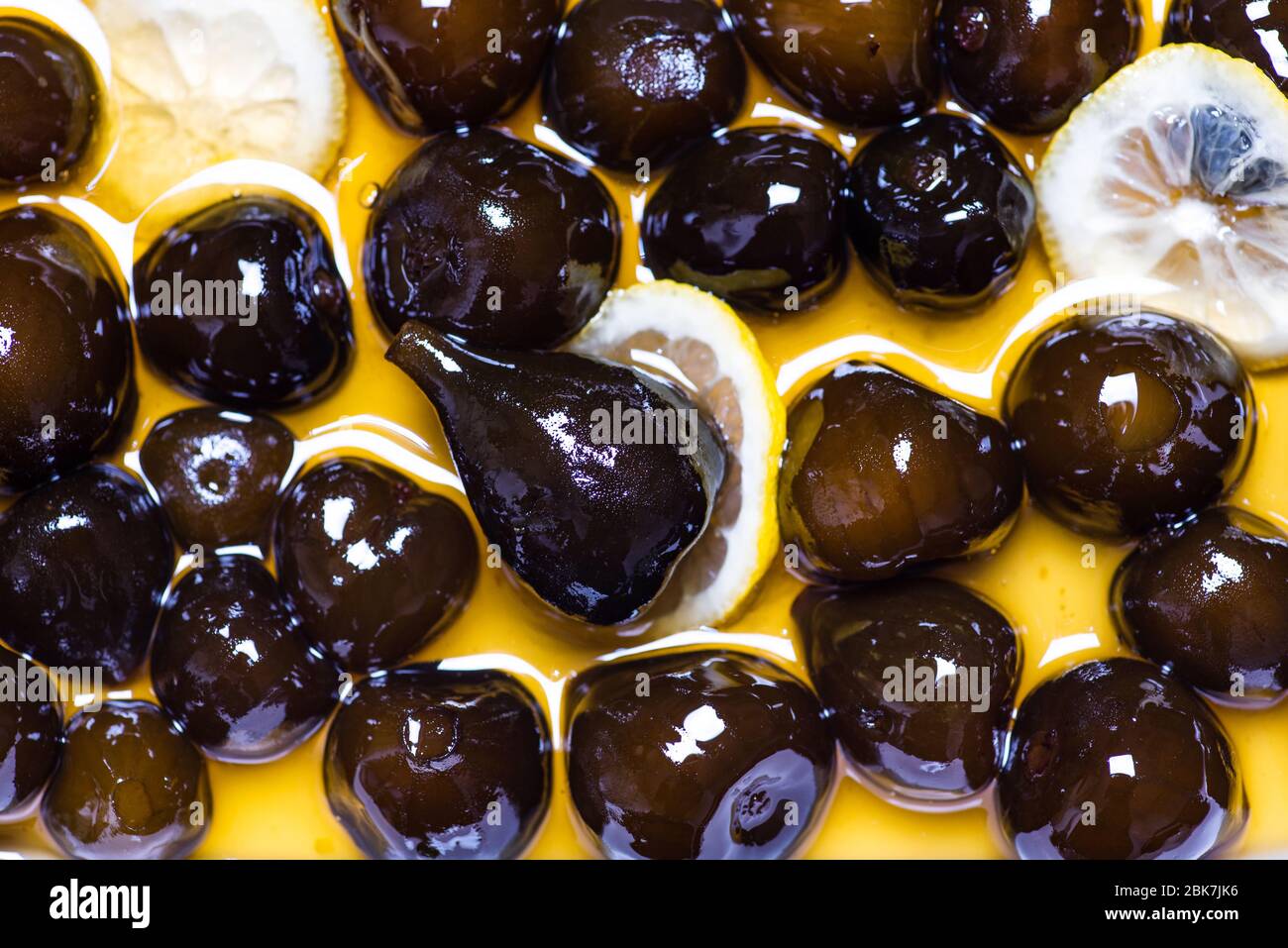 Sweet boiled figs with lemon background pattern top view Stock Photo ...