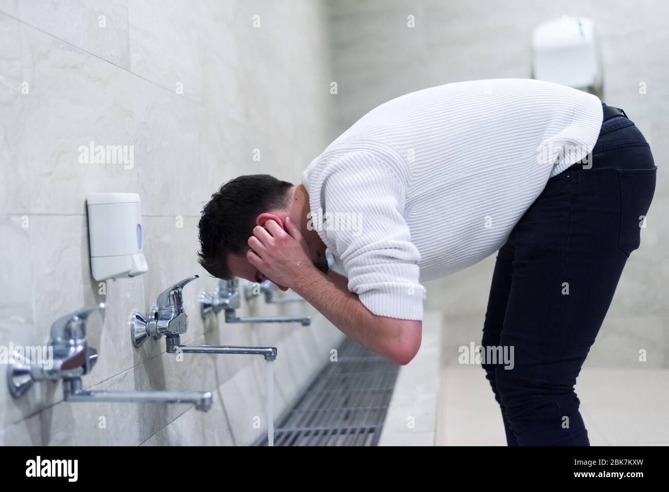 Muslim man taking ablution for prayer. Islamic Religious Rite Ceremony ...