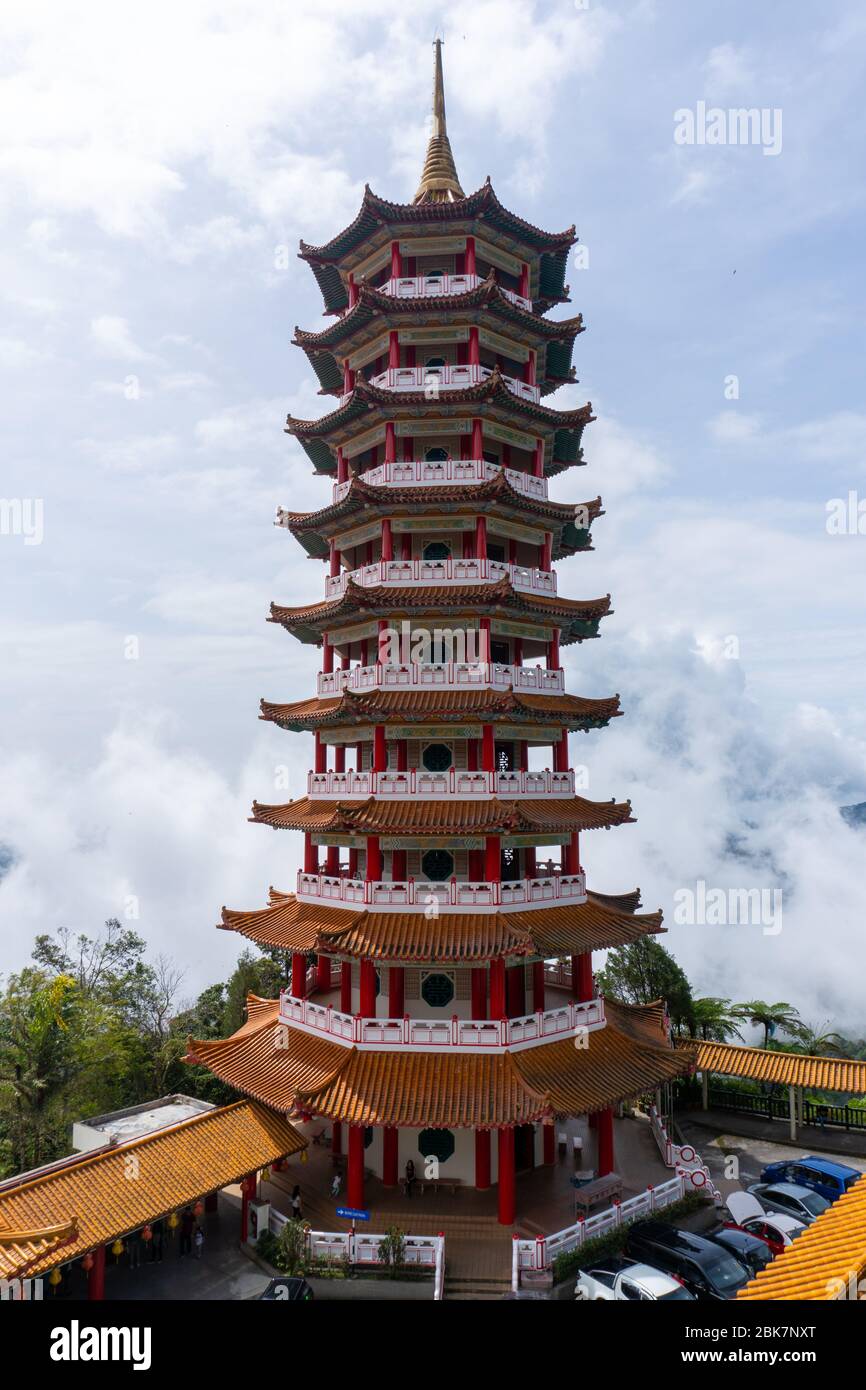 Chinese temple at Genting highland. Clouds above mountains. Malaysia ...