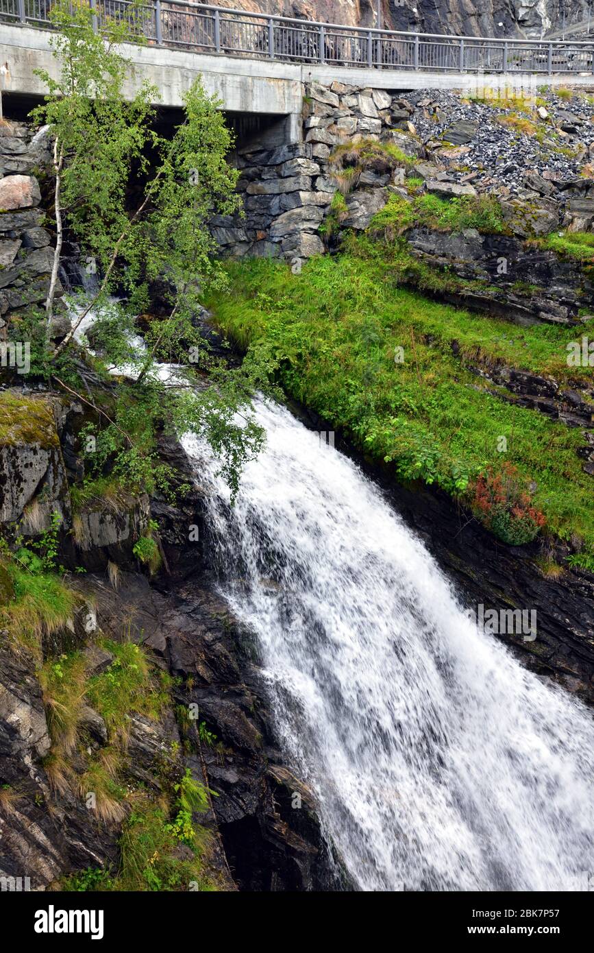 The Ljoelva River cascades down the mountainside at the Geirangerfjord ...