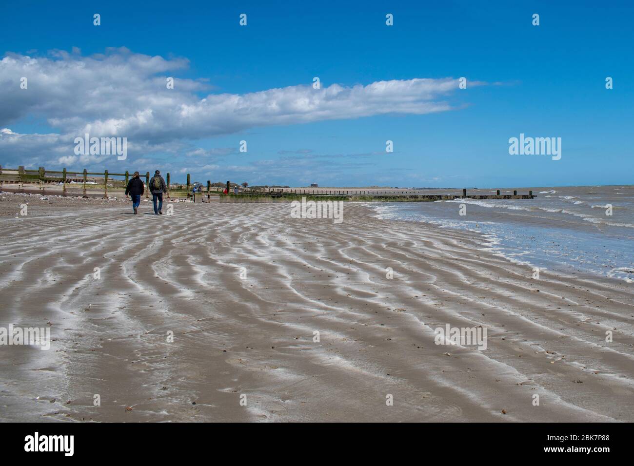 Climping beach couple hi-res stock photography and images - Alamy