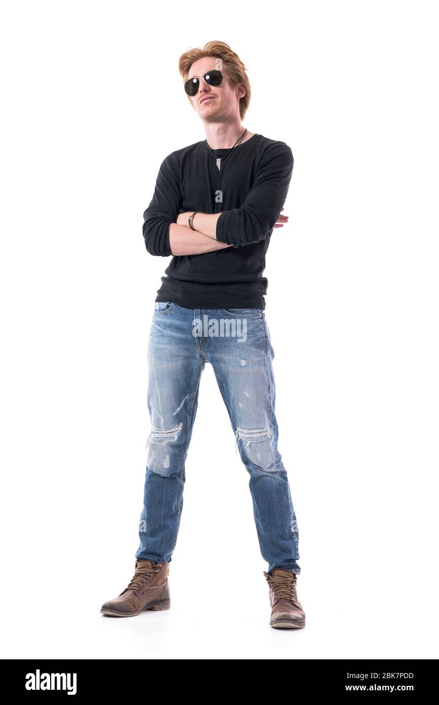 Happy confident young handsome ginger man wearing sunglasses with ...