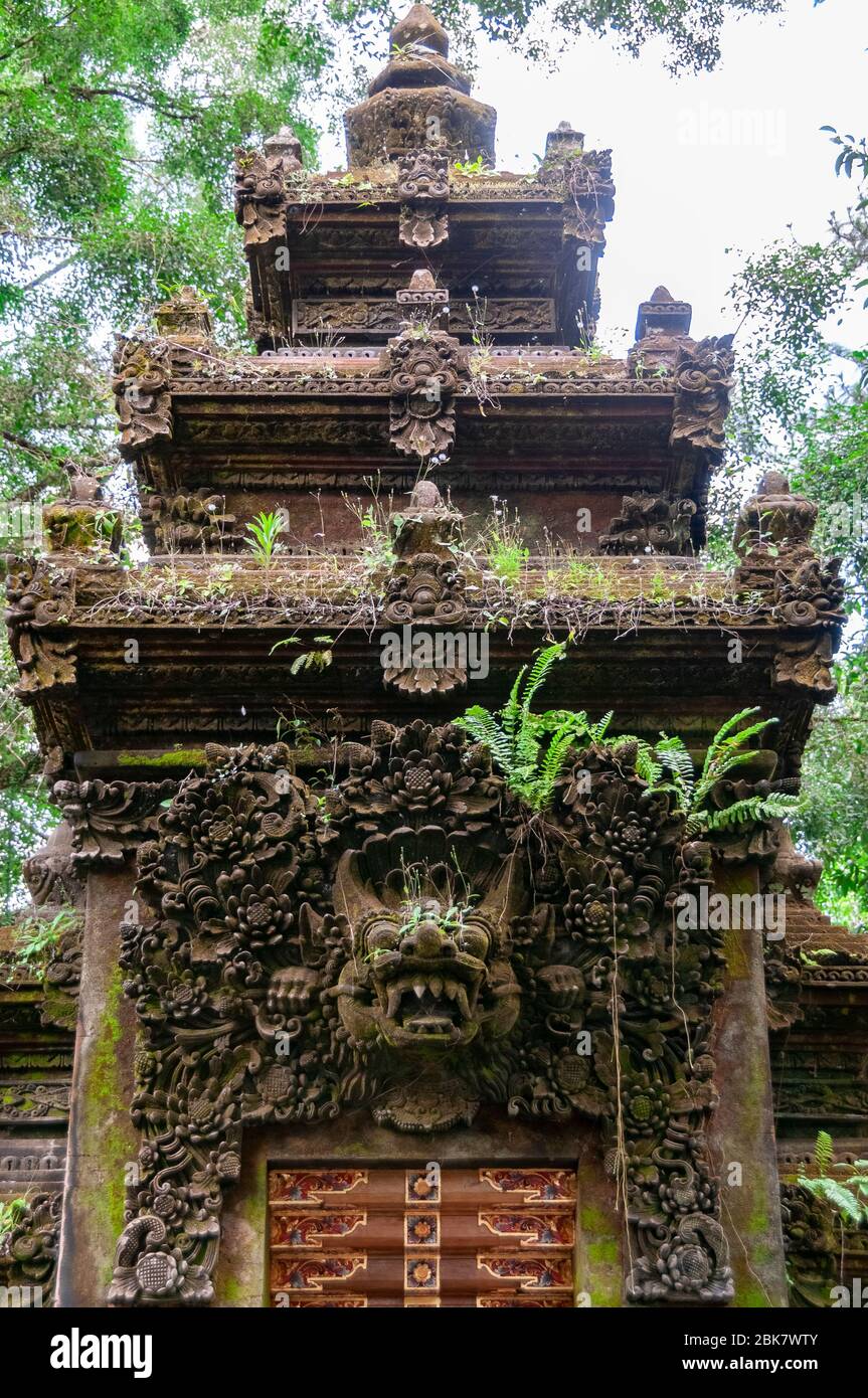 Stone carving over gateway at Tirta Empul Holy Springs Bali Indonesia ...