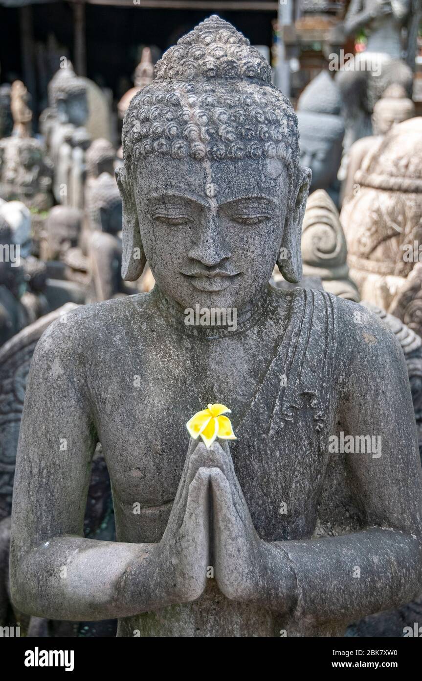 Buddhist statue at stonemasons workshop Bali Indonesia Stock Photo - Alamy