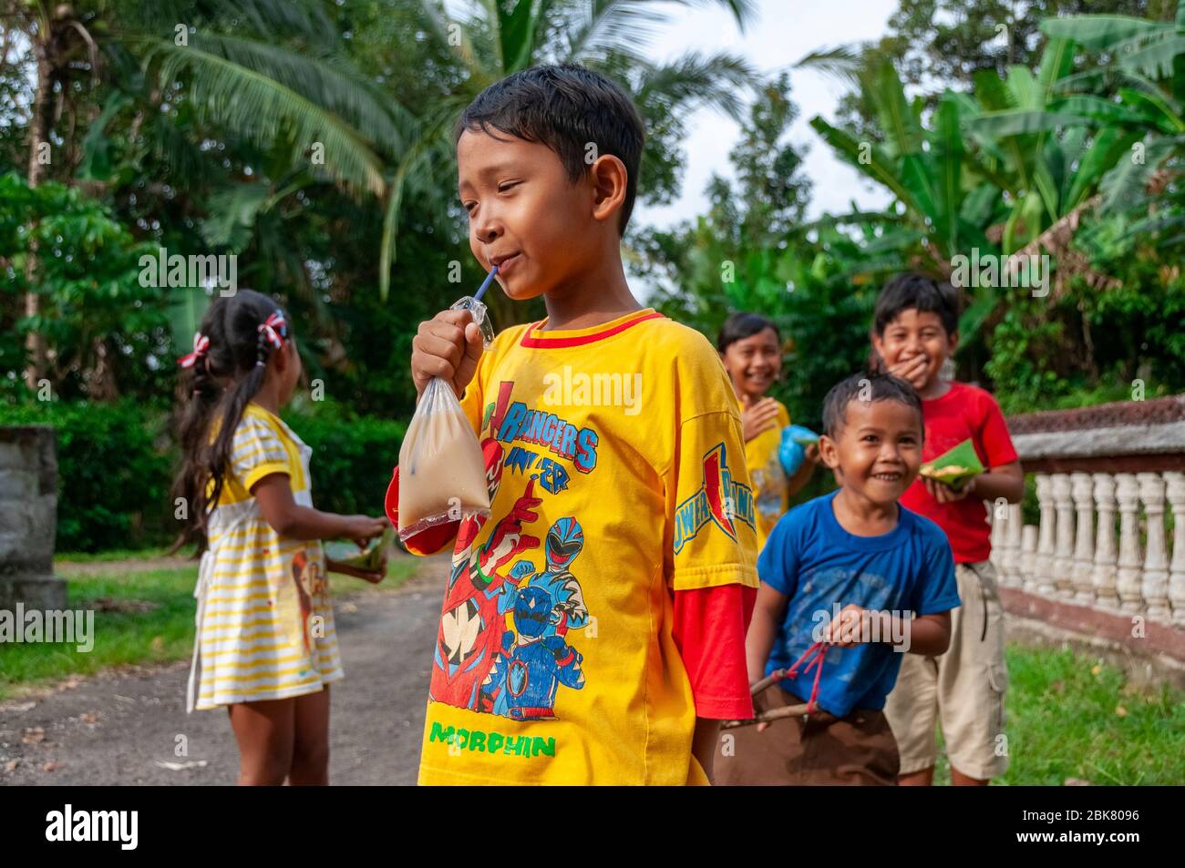 Group of playing children Bali Indonesia Stock Photo - Alamy