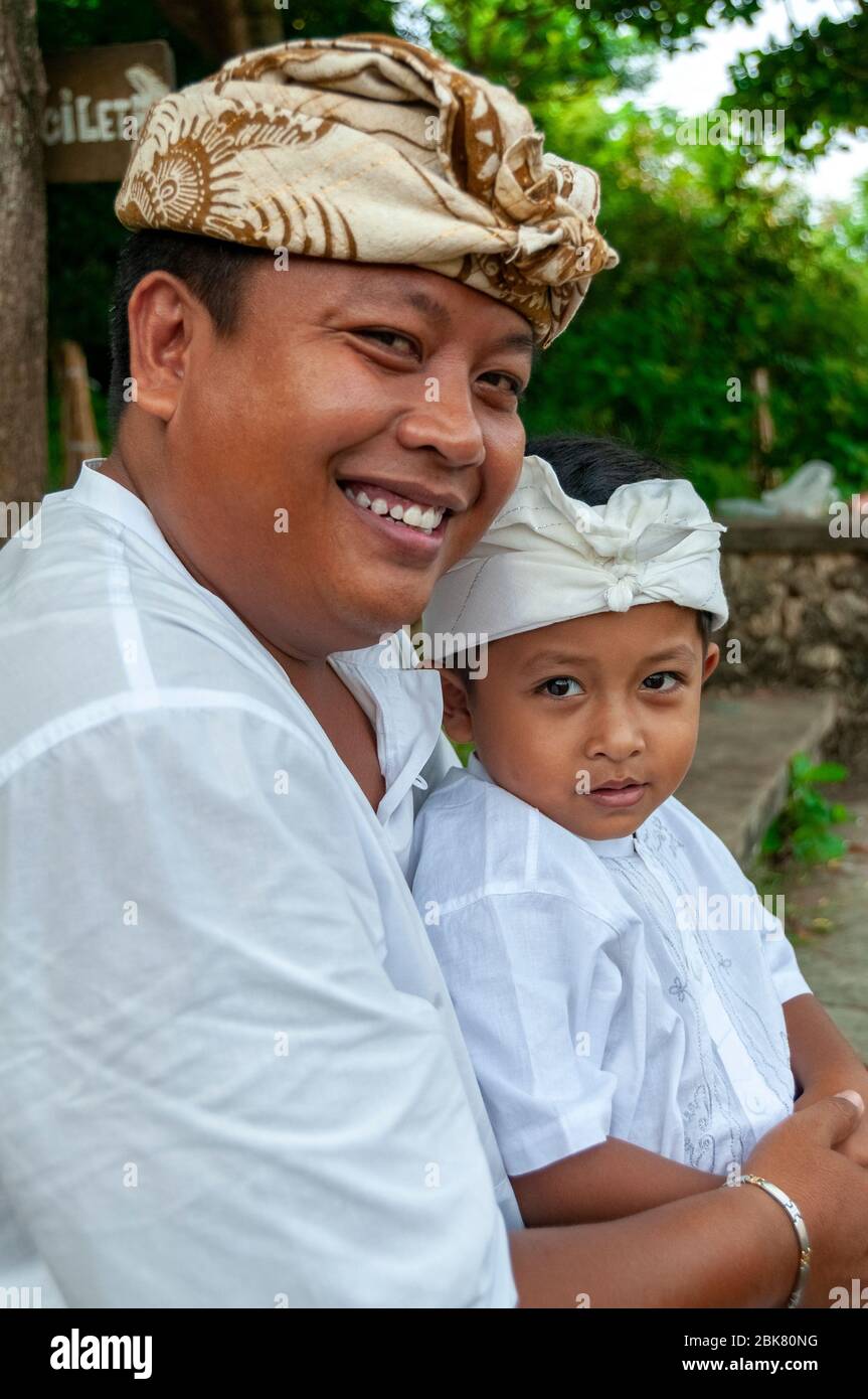 Balinese father and son Bali Indonesia Stock Photo - Alamy