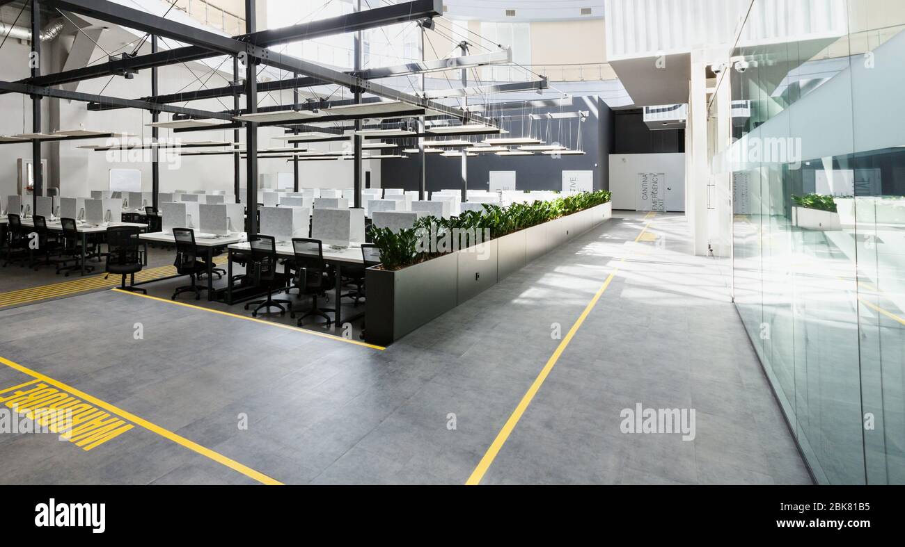Office interior with open space and yellow restrictive zones Stock ...