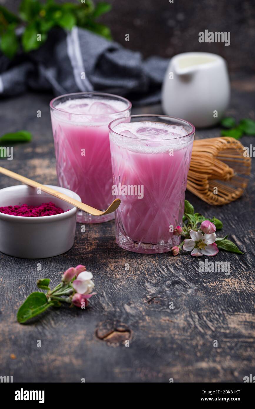 Pink matcha ice latte with milk Stock Photo - Alamy