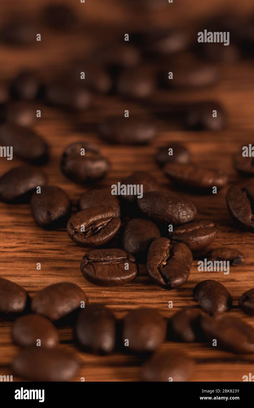 Roasted Coffee Beans Spread Out on a Solid Oak Butcher Block Counter ...