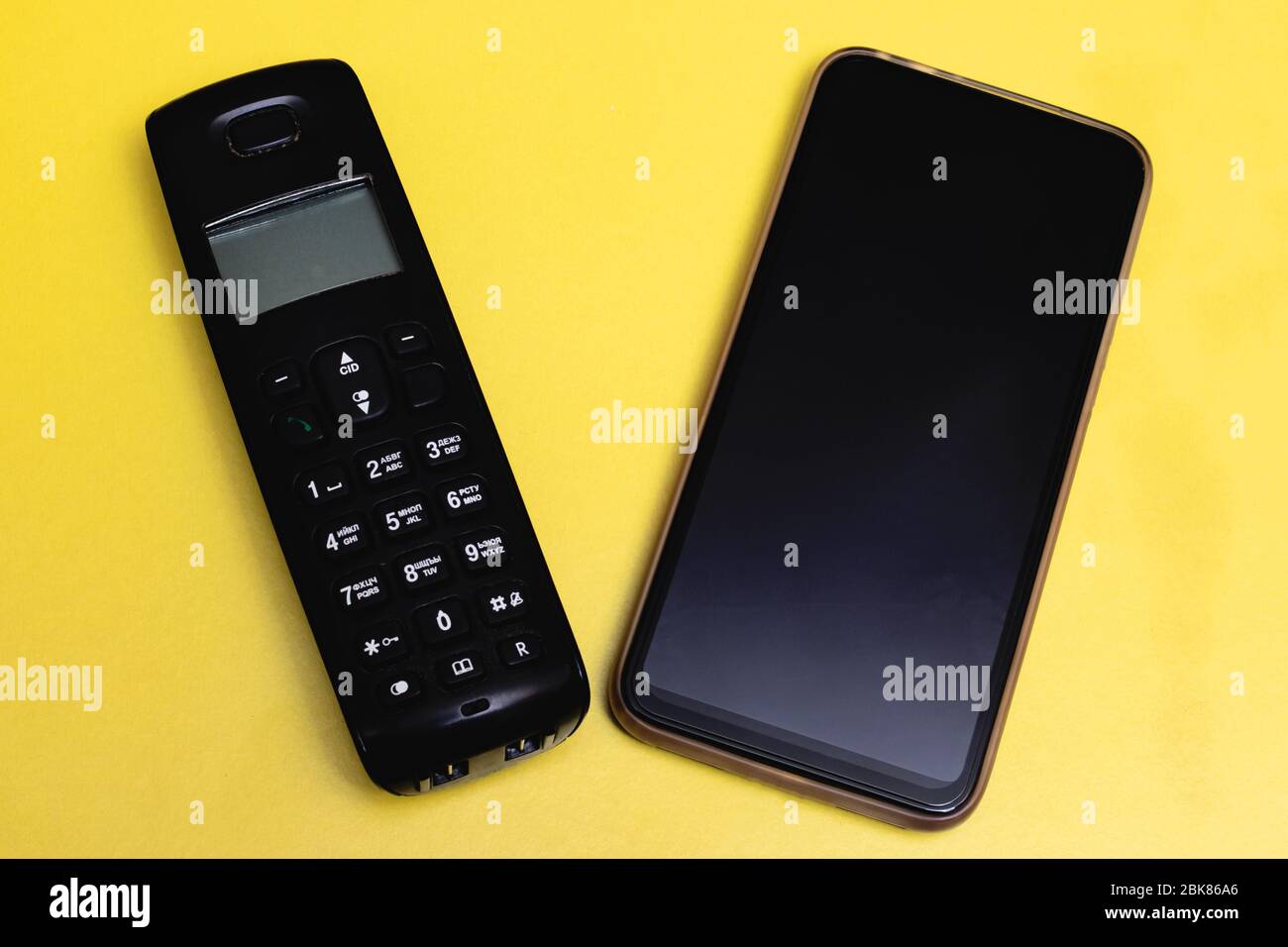 Old push-button telephone and modern smartphone close up Stock Photo ...