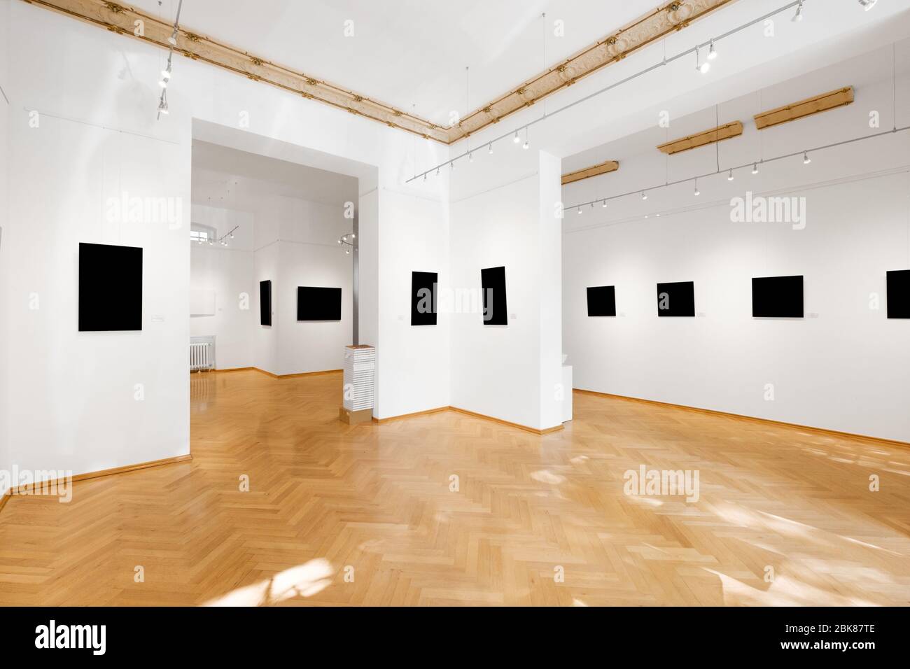 empty gallery room with picture frames mock-up Stock Photo - Alamy